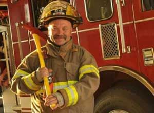 Miss. firefighter keeps clothes on as Mr. February