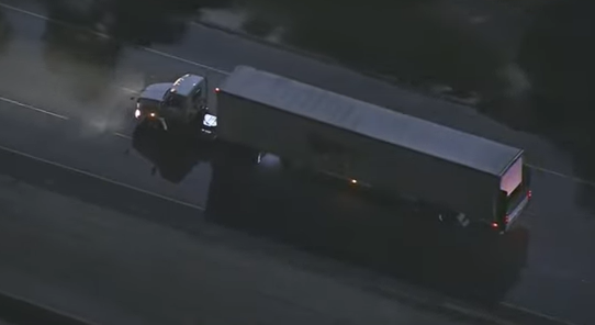 Watch: Stolen big rig leads 6-hour police pursuit, ending in a standoff