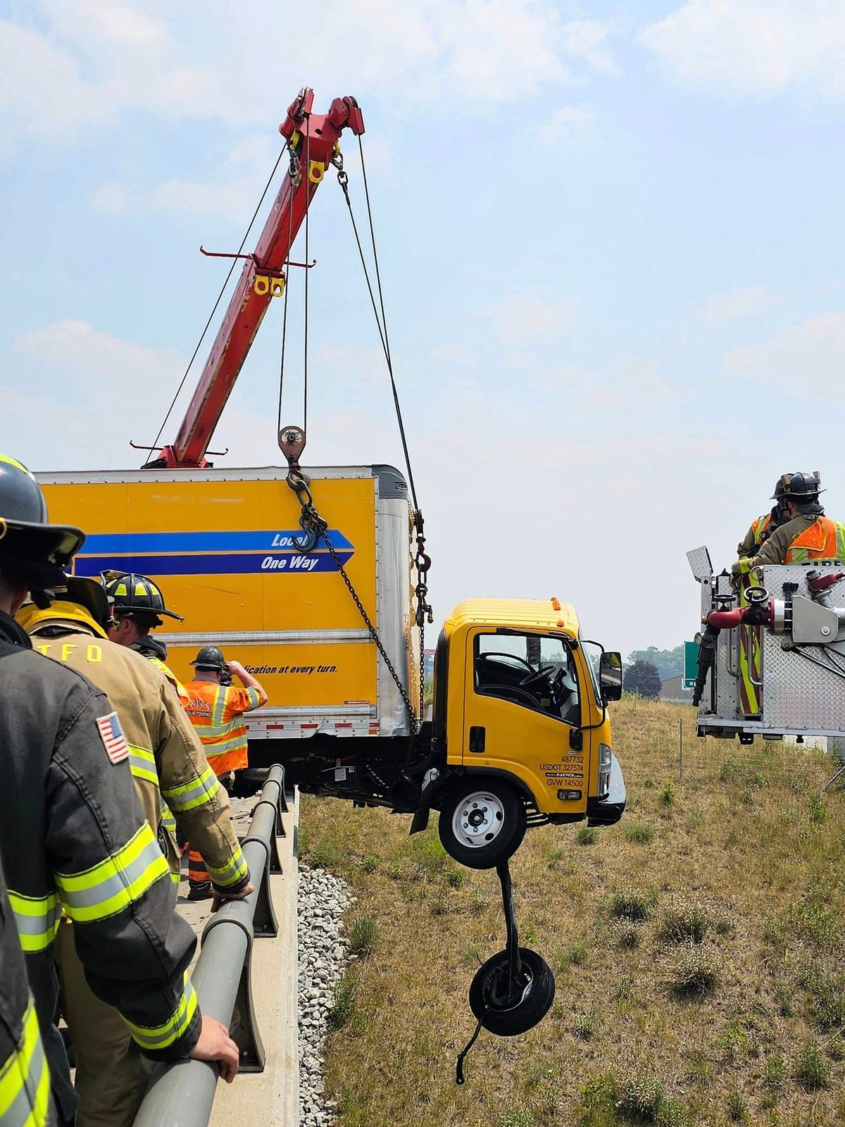 Watch: Ind. FFs rescue couple in truck hanging off bridge
