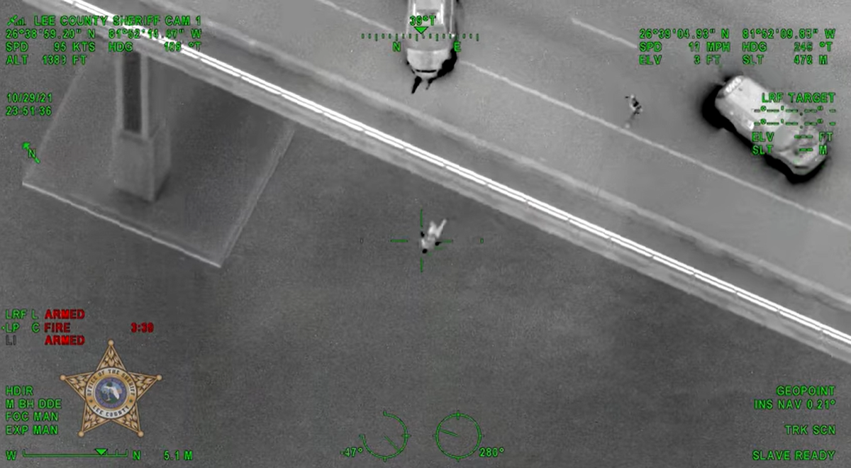 Watch: Man dives off bridge to escape cops after crashing van