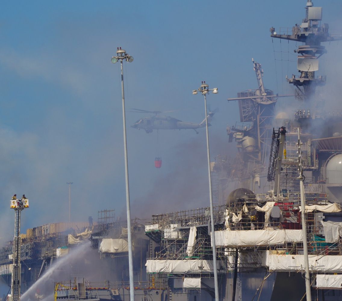 11 of 14 decks damaged in Navy ship fire, officials say