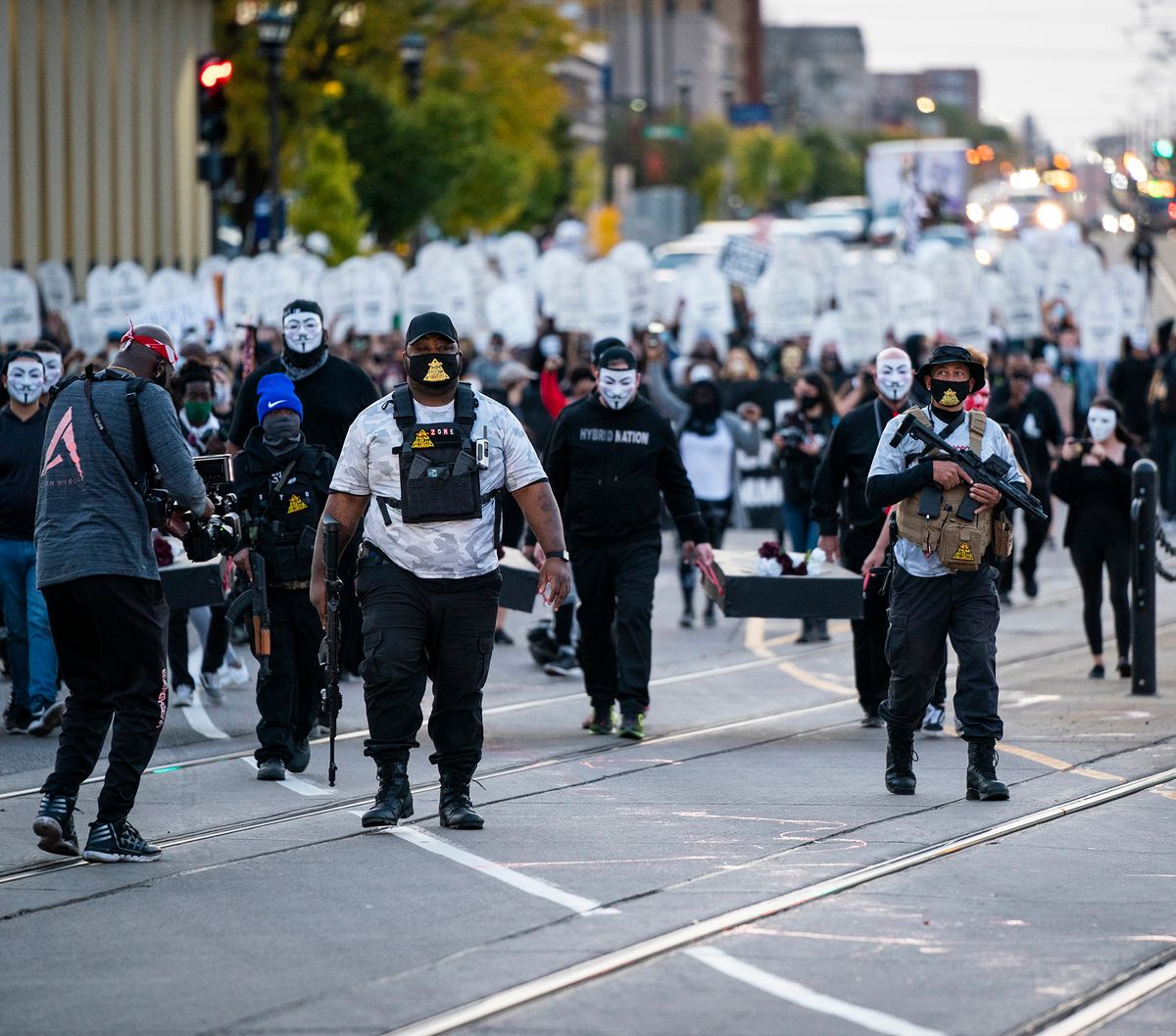 Hundreds march in 2nd night of Minn. protests
