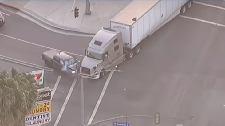 Video: Big rig driver crashes into murder suspect's truck to end police ...