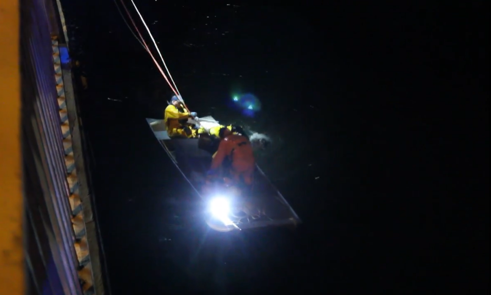 Video: Iowa firefighters rappel from bridge to rescue woman in river