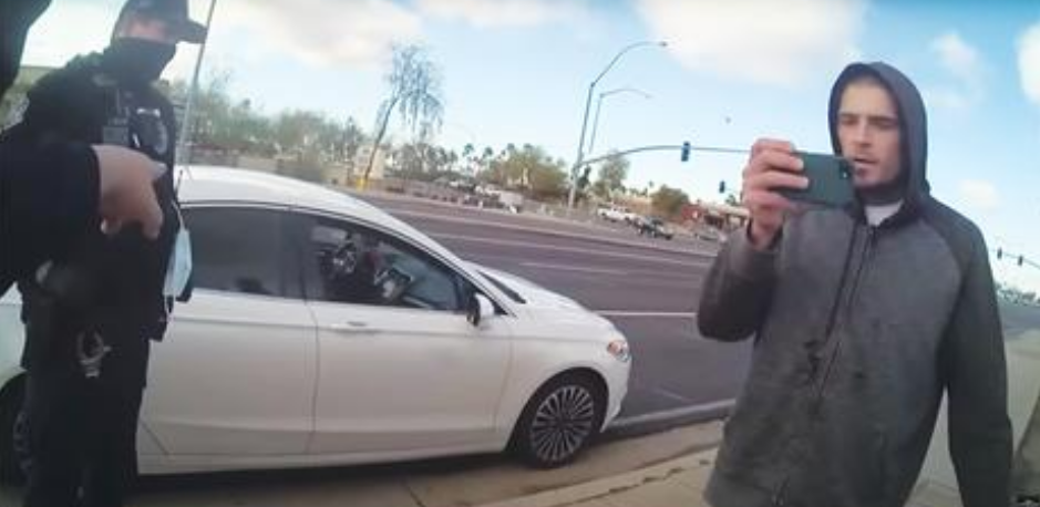 Ariz. 'guerilla journalist' jailed for police filming, accessing ...