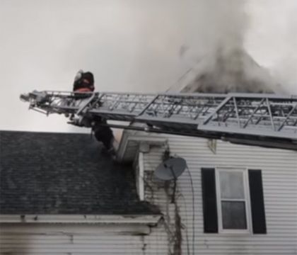 Video: Maine firefighter falls through roof, rescued