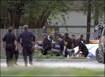 Dallas officer dies in shootout following car chase